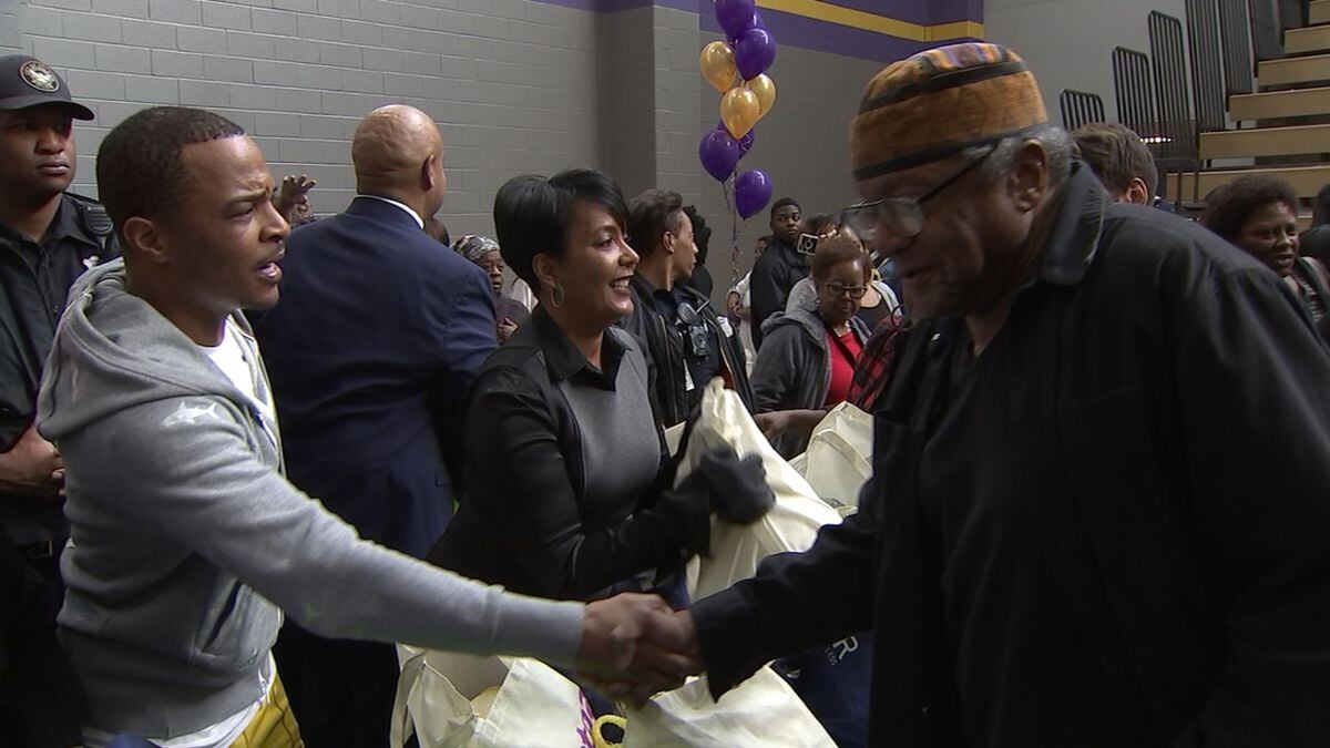 Atlanta rapper joins mayor to hand out turkeys to senior citizens