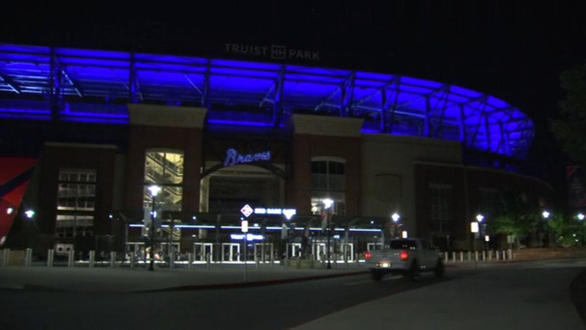 Atlanta buildings light up night skies in blue to support frontline workers